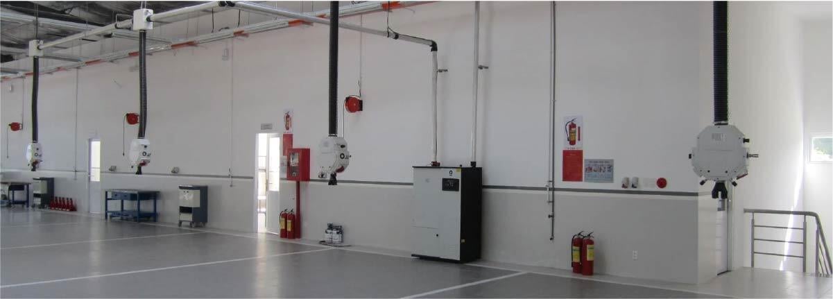 Why are industrial dust extraction systems necessary?